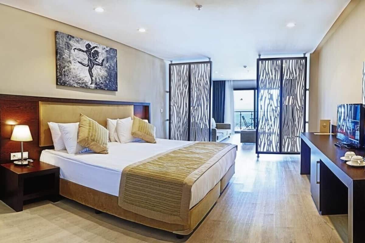 Quarto Superior, 1 quarto, vista para o mar | 1 quarto, minibar com produtos grátis