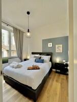 Apartamento família | 2 quartos, roupas de cama premium, edredons de pluma