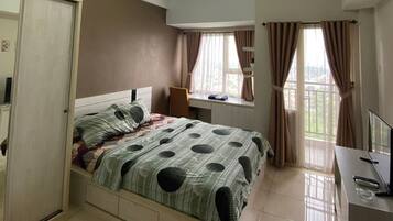 Suíte estúdio standard, 1 cama de casal | Escrivaninha, cortinas blackout, Wi-Fi de cortesia, roupa de cama