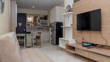 Apartamento | Sala de estar | Televisor