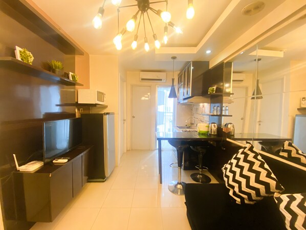 Apartamento | Sala de estar | Televisor