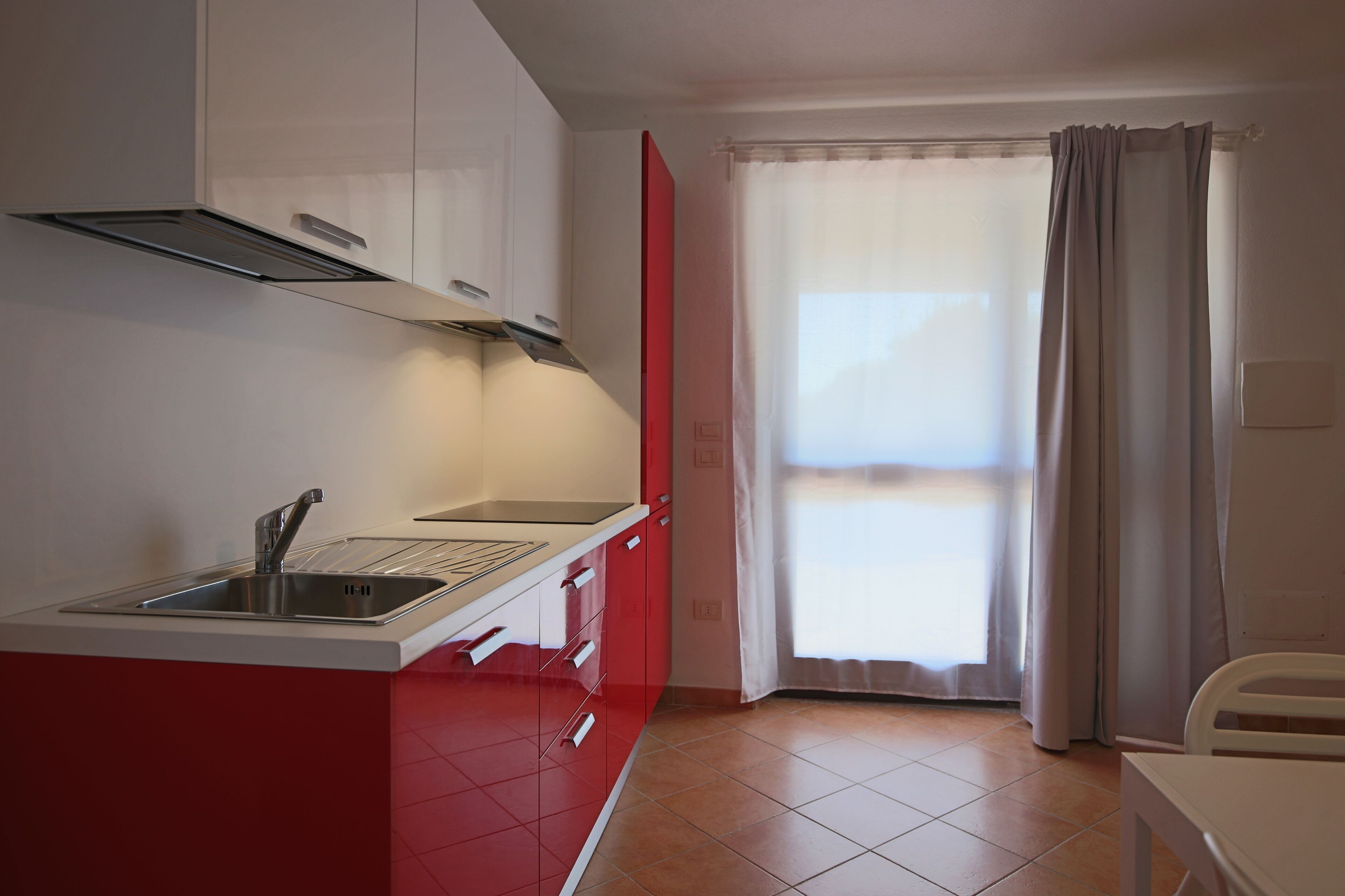 Apartamento Familiar | Cozinha privada | Uma cadeira de bebé, mesas de jantar 