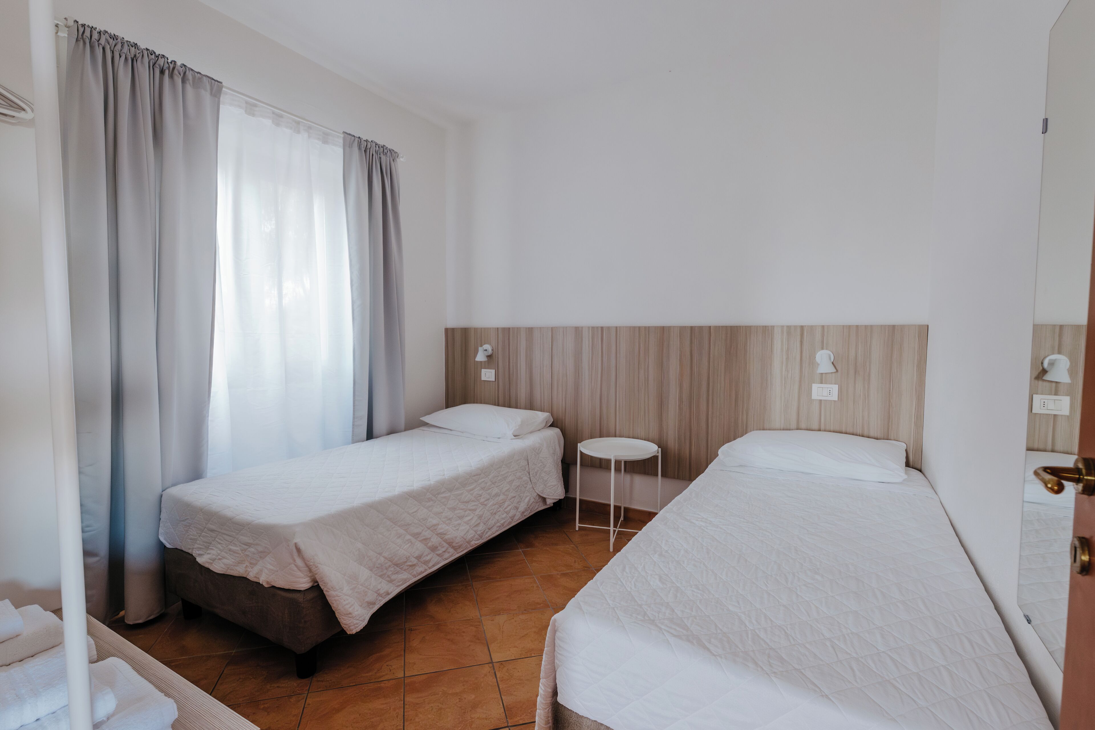 Apartamento família | Roupas de cama premium, cofres nos quartos, berço de viagem