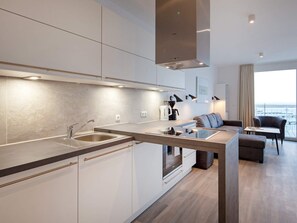 Apartamento | Cozinha privada | Geladeira