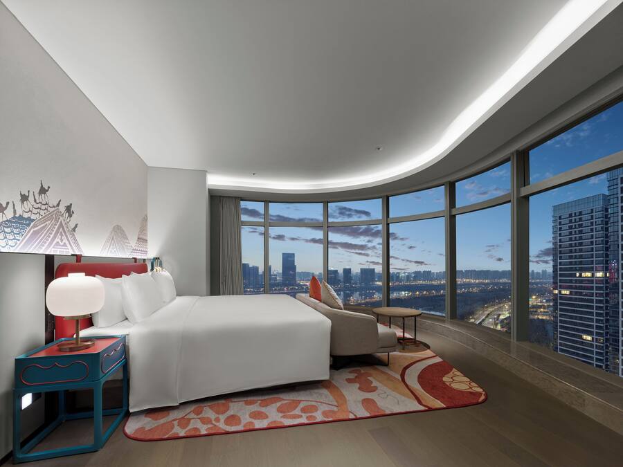 Suite Panorâmica | Edredões de penas, minibar, cofre no quarto, secretária