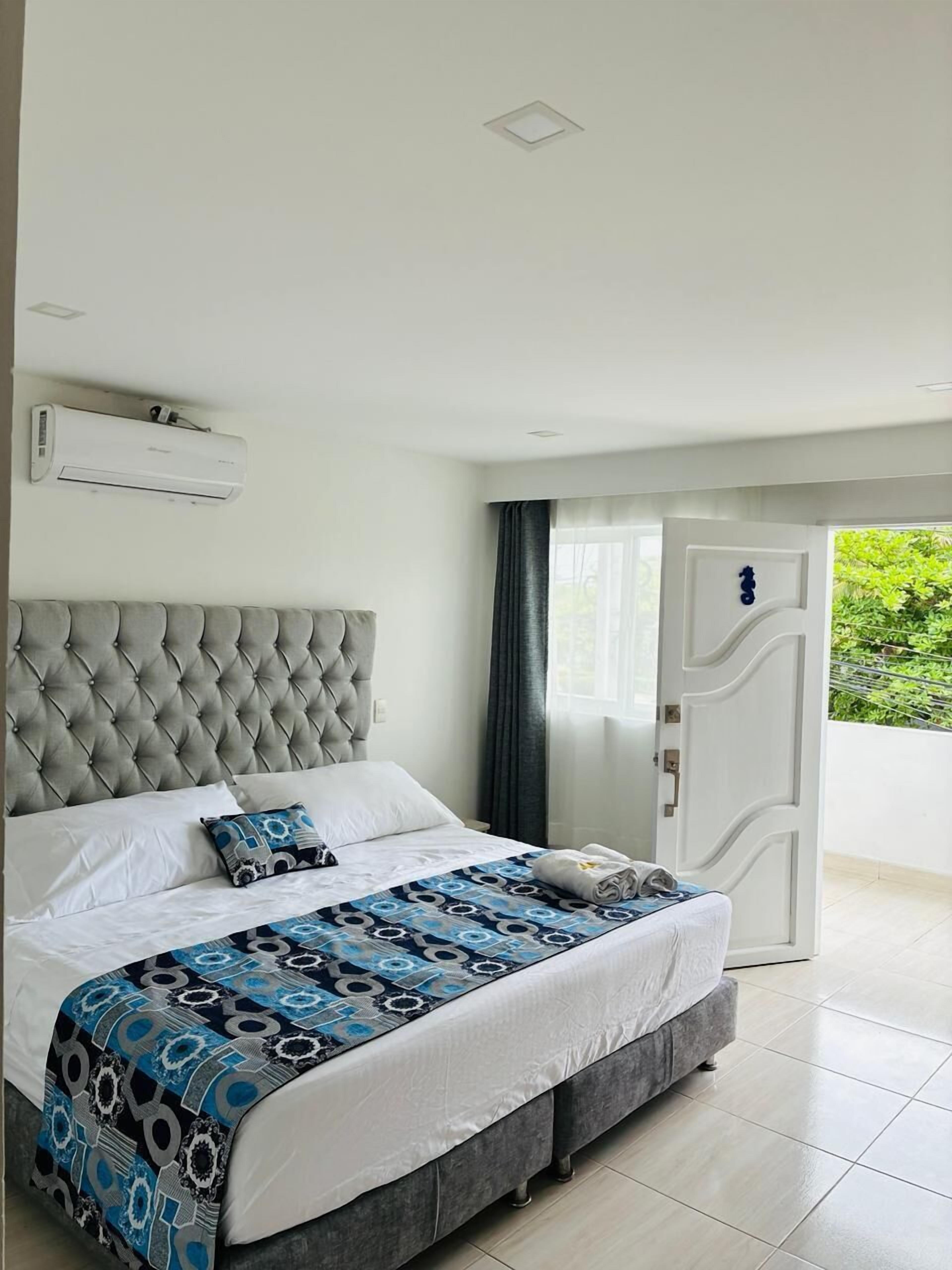 Quarto Duplo Deluxe | Ferro/tábua de engomar, roupa de cama fornecida 