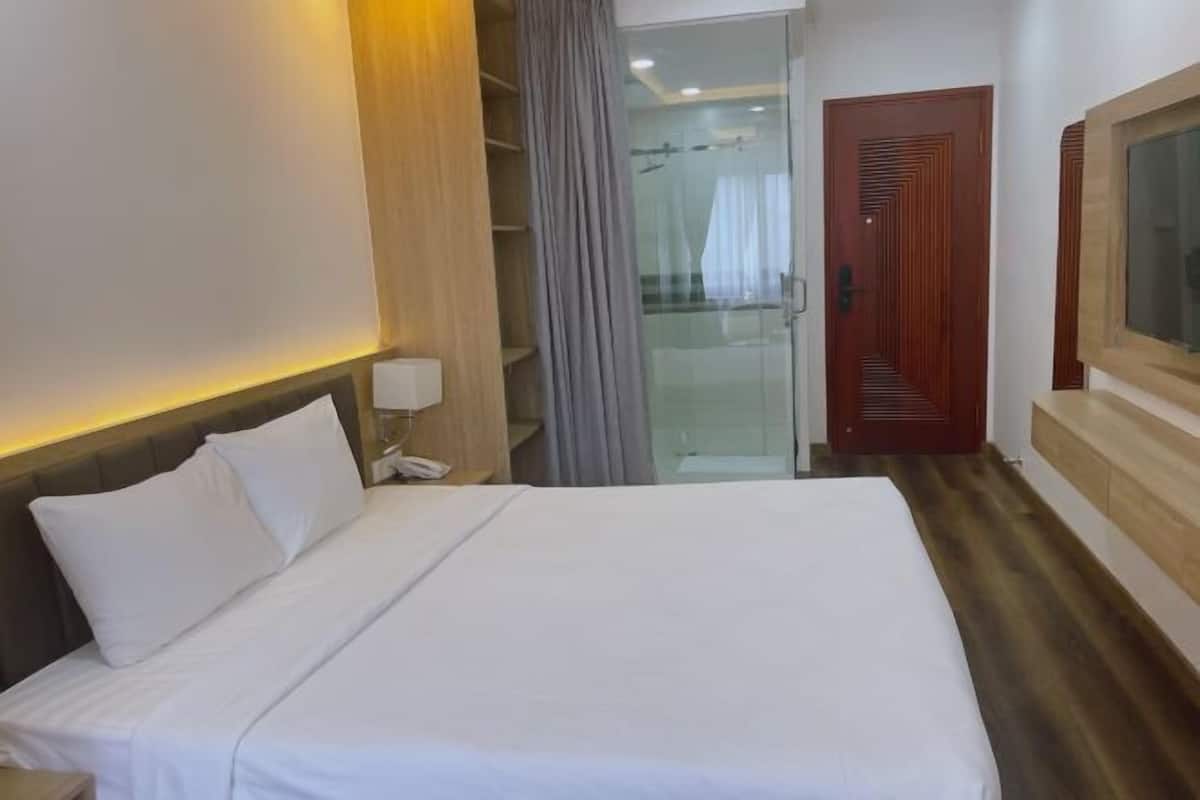 Frigobar, cortinas blackout, Wi-Fi de cortesia, roupa de cama