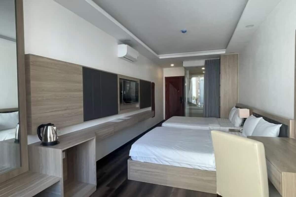 Frigobar, cortinas blackout, Wi-Fi de cortesia, roupa de cama