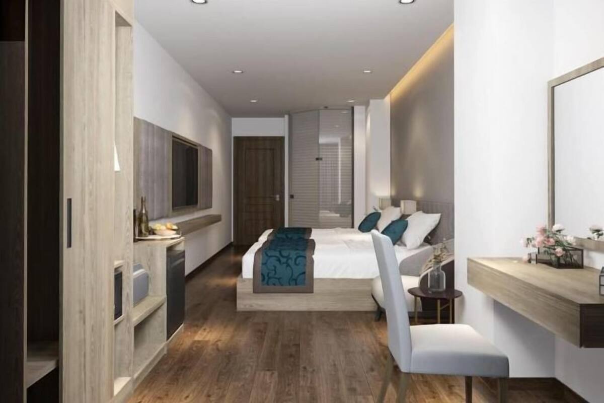 Frigobar, cortinas blackout, Wi-Fi de cortesia, roupa de cama