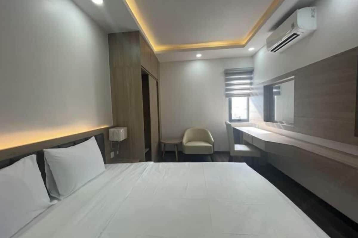 Frigobar, cortinas blackout, Wi-Fi de cortesia, roupa de cama