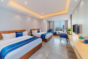 Quarto executivo, várias camas | Vista do quarto