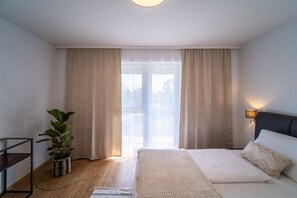 Familienzimmer, 1 Zimmer (incl. City Tax) | Roupas de cama antialérgicas, cortinas blackout, Wi-Fi de cortesia