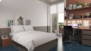 Quarto moderno com cama, escrivaninha e computador. Há livros e plantas na escrivaninha, e uma janela com vista para o exterior.