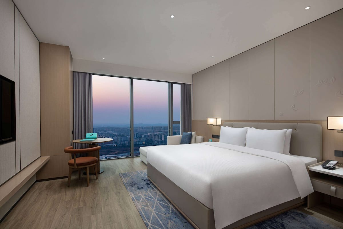 Quarto empresarial, 1 cama King, para não fumantes | Wi-Fi de cortesia