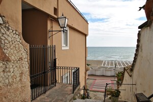 Casa, 2 quartos, fumadores, varanda | Praia