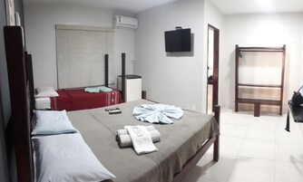 Quarto Triplo Comfort | Roupa de cama fornecida 