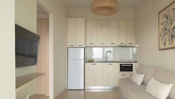 Suite Júnior, 1 quarto | Cozinha privada | Um frigorífico, um forno, uma máquina de lavar louça