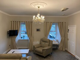 Quarto Deluxe | Sala de estar | Smart TV 