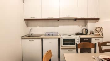 Apartamento | Cozinha privada | Geladeira, fogão, cafeteira/chaleira, chaleira elétrica