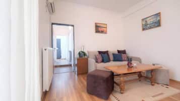 Apartamento família | Quartos à prova de som, Wi-Fi de cortesia, roupa de cama