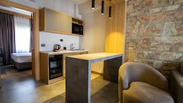 Suíte superluxo | Cozinha americana privada | Frigobar