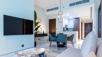 Apartamento Executivo | Sala de estar | Smart TV de 55 polegadas com canais por cabo
