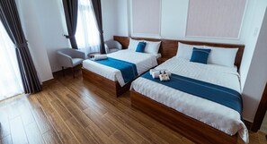 Quarto premium, 2 camas Queen, sacada, vista para a cidade | Vista para a cidade