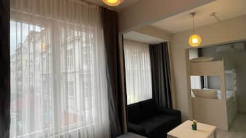 Quarto Quádruplo Standard | Minibar, cofre no quarto, quartos insonorizados, ferro/tábua de engomar