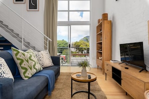 Apartamento Nobre | Sala de estar | Televisor de ecrã plano de 50 cm com canais por cabo, televisor