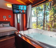 Chalé design | Banheiro | Chinelos, bidê, toalhas de banho, sabonete