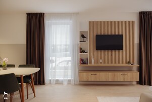 Apartamento premium | Roupas de cama premium, frigobar (abastecido com alguns itens grátis)