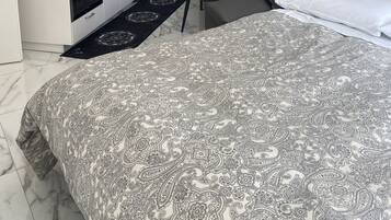 Quarto Duplo de Luxo | 1 quarto, cortinas/cortinados opacos, Wi-fi grátis