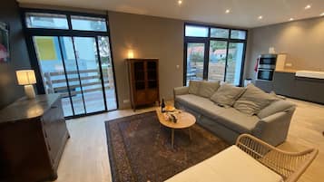 Apartamento Nobre | Sala de estar | Televisor LED de 50 polegadas com canais via satélite, televisor
