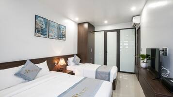 Quarto Triplo Signature | Secretária, quartos insonorizados, Wi-fi grátis