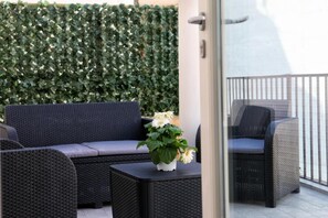 Quarto Triplo Deluxe, Vista para a cidade (5) | Terraço/pátio interior