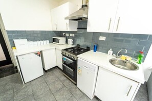 Estúdio | Cozinha privada | Geladeira, micro-ondas, fogão, cooktop