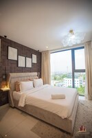 Penthouse Exclusiva | Roupa de alta qualidade, edredões de penas, com decoração personalizada 