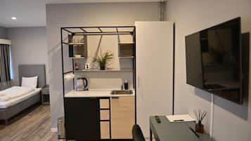 Suite Deluxe | Cozinha privada | Uma chaleira elétrica