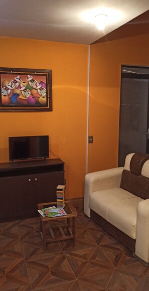 Apartamento família, 2 quartos | Área de estar