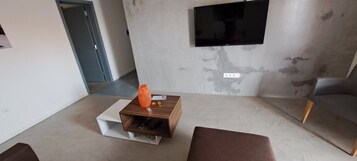 Apartamento Clássico | Sala de estar | Smart TV de 42 polegadas com canais digitais 