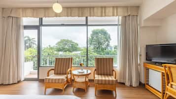 Quarto Deluxe, vista para o jardim | Varanda