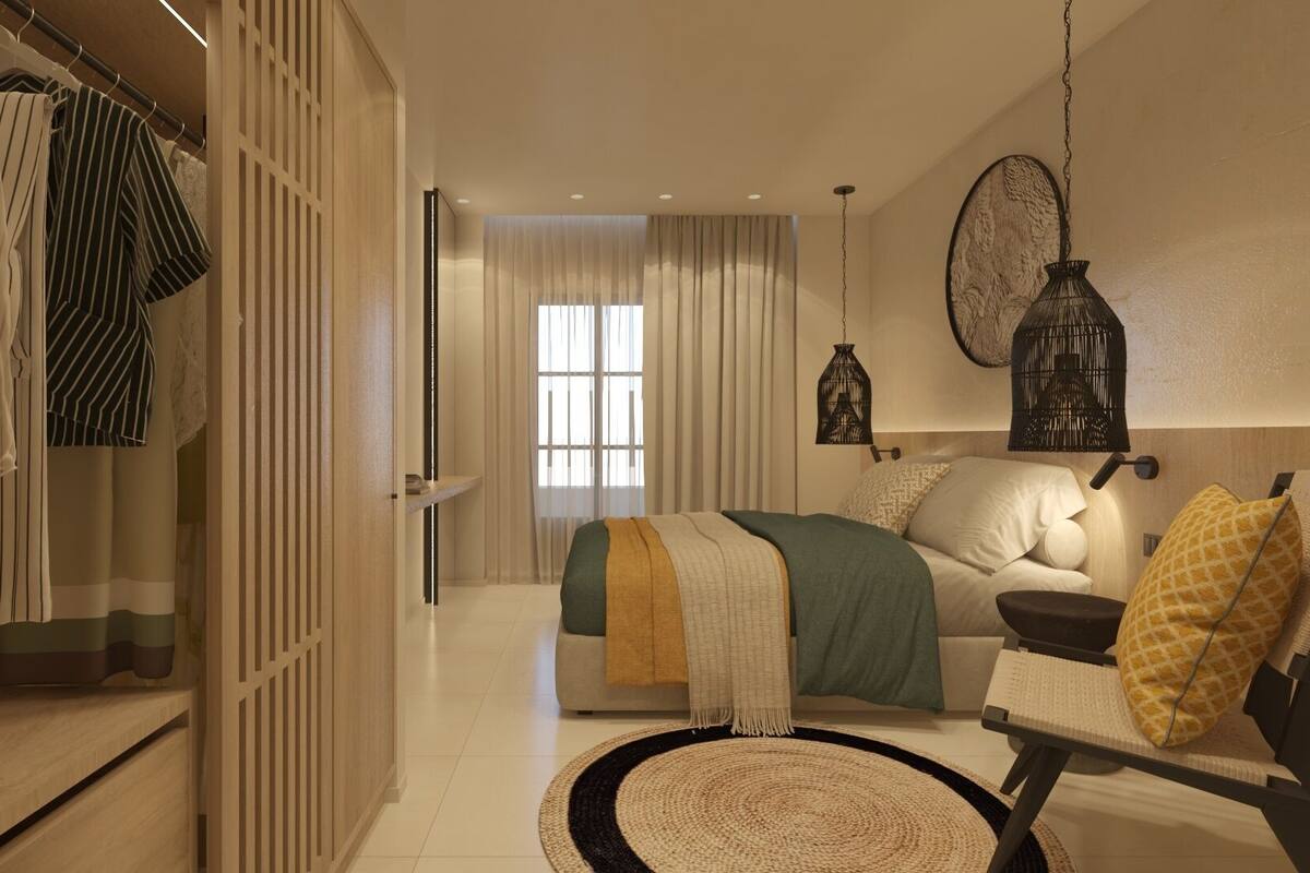 Quarto com cama, cadeira, guarda-roupa e janela.