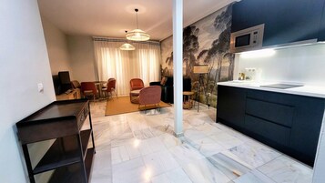 Apartamento superior | Cozinha privada | Lava-louças, chapa, talheres/pratos/utensílios de cozinha
