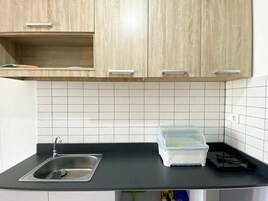 Apartamento | Cozinha privada | Um frigorífico/congelador grande, uma placa de cozinha 