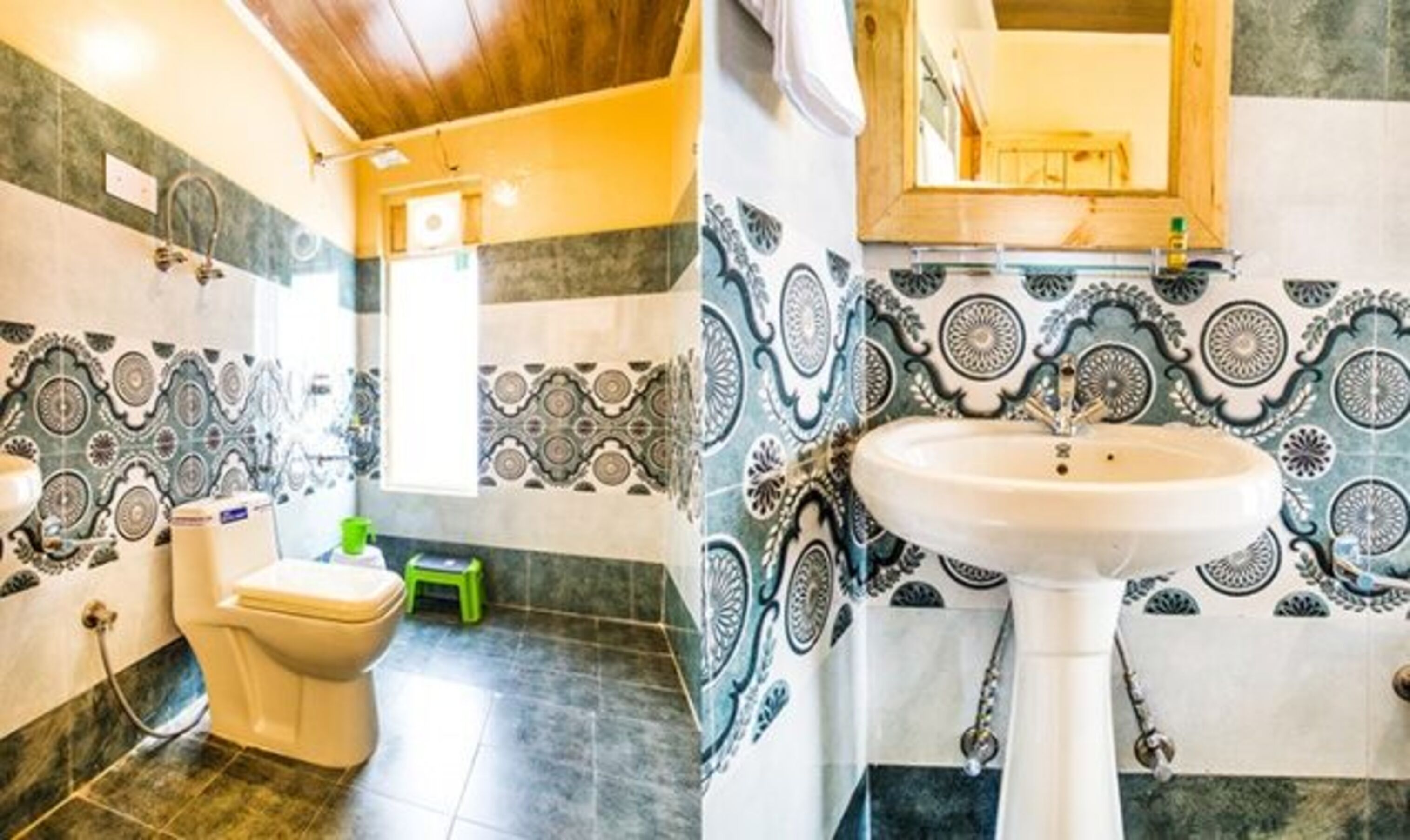 Casa de banho com sanita, lavatório e azulejos decorativos.