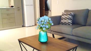 Apartamento Deluxe | Sala de estar