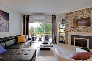 Apartamento, 1 quarto, acesso à piscina | Sala de estar