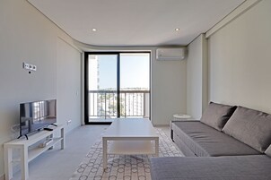 Apartamento, 1 quarto, terraço, de frente para o mar | Sala de estar