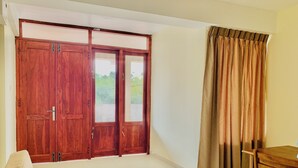 Quarto casal conforto | Área de estar