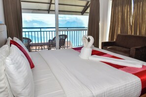 Quarto premium, 1 cama Queen, sacada | Roupa de cama